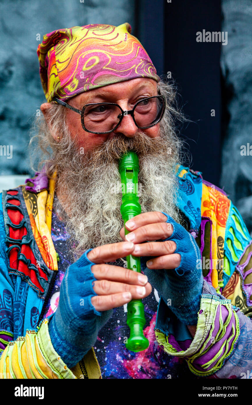 Street musician playing flute hi-res stock photography and images - Alamy