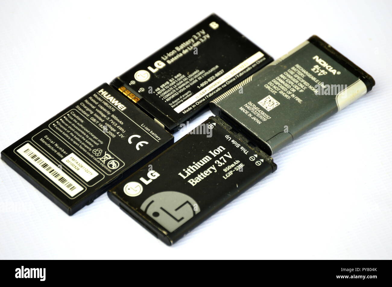 Some Lithium Ion batteries on white background Stock Photo - Alamy