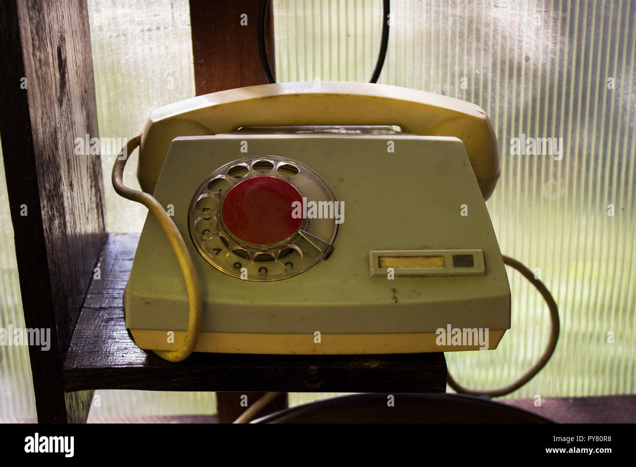 Vintage rotary telephone on the shelf as part of the collection. Russia ...