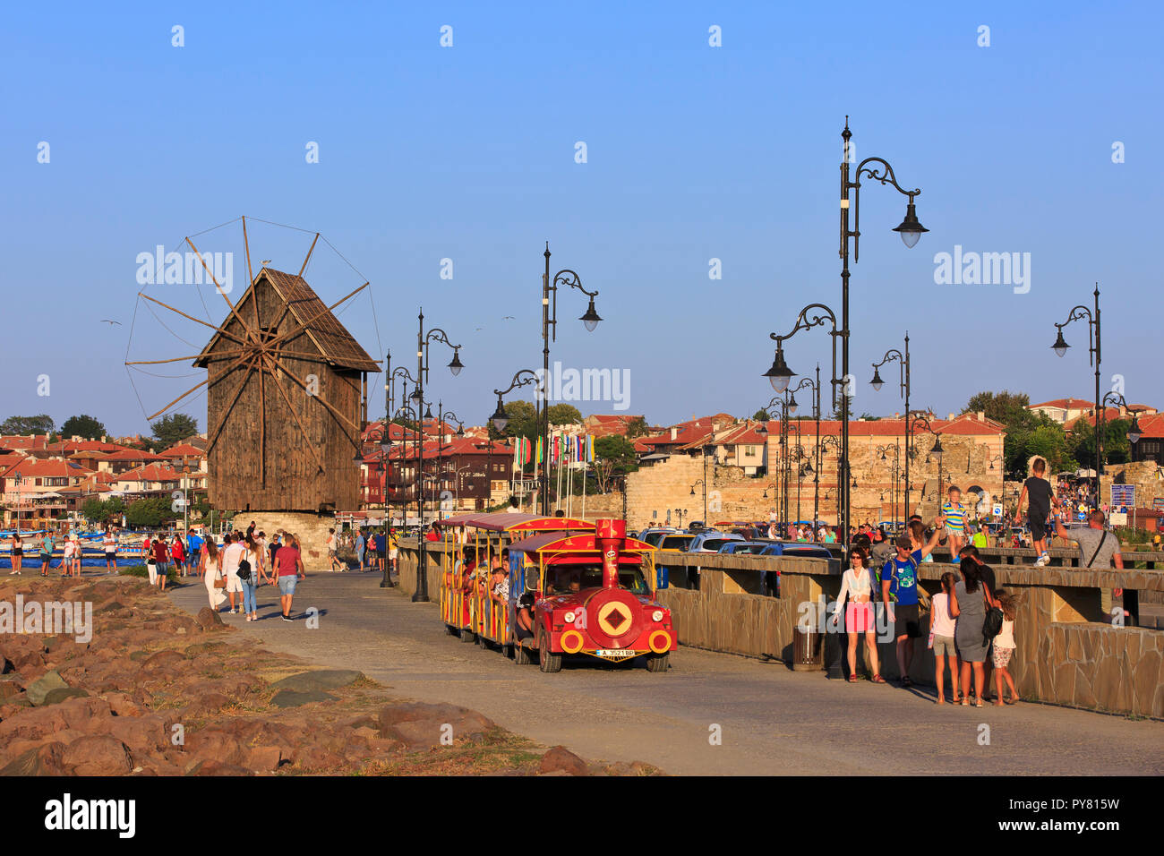 The wooden windmill on the isthmus leading to the ancient city walls ...