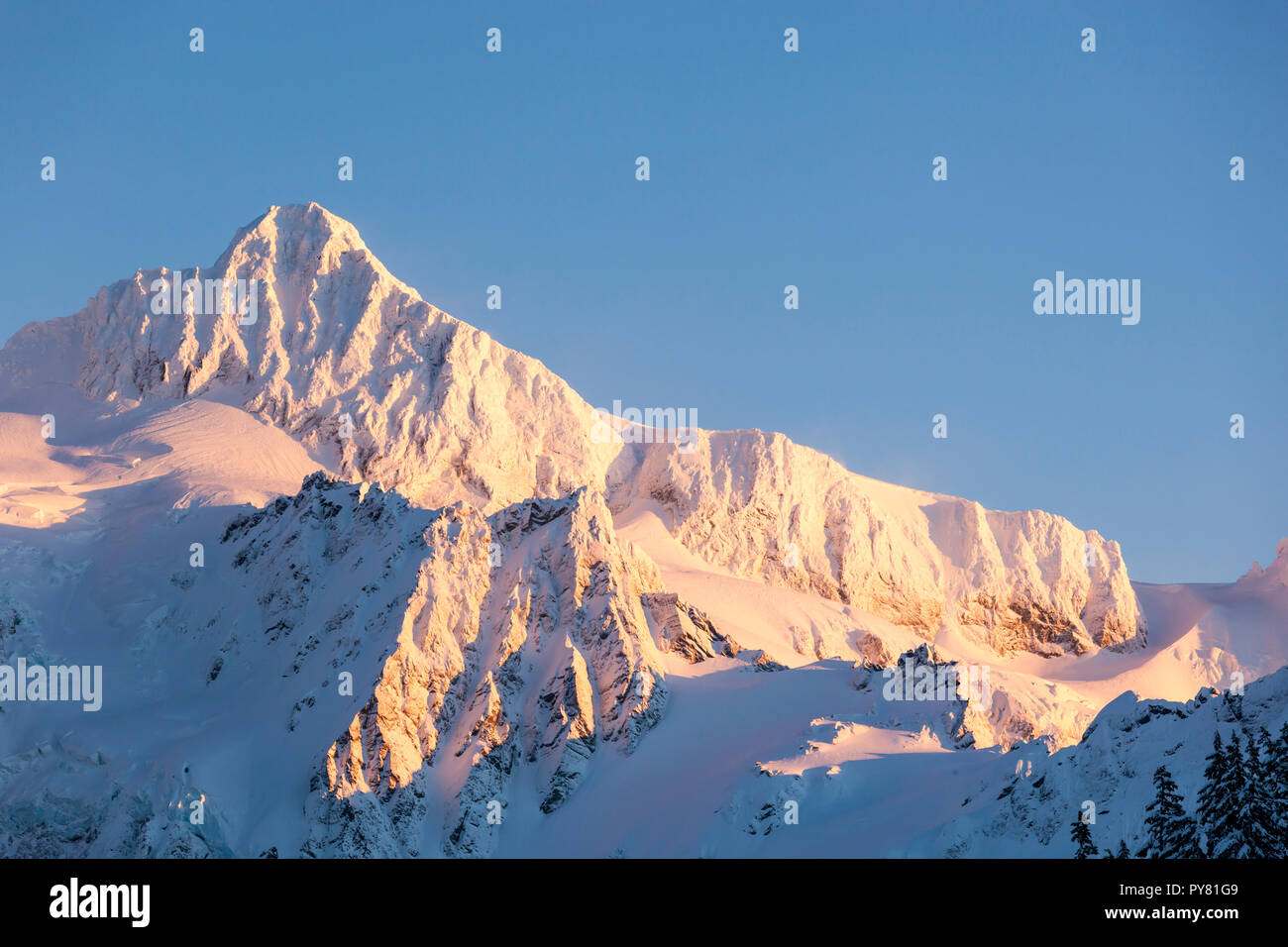 Mount Shuksan mountain peak summit in winter snow. Beautiful North ...