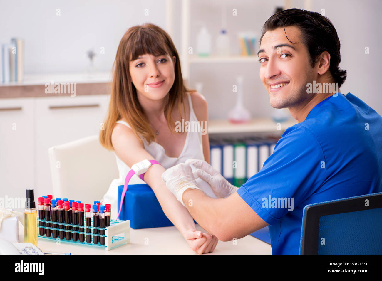 Young patient during blood test sampling procedure Stock Photo - Alamy
