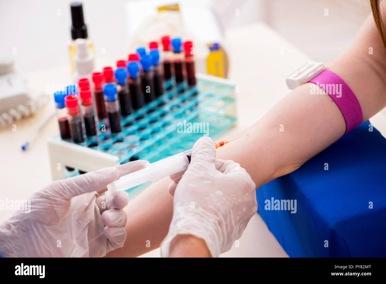 Young patient during blood test sampling procedure Stock Photo - Alamy