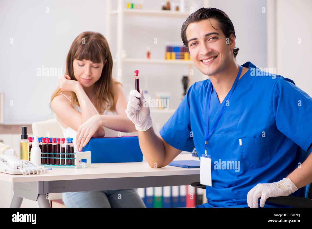 Young patient during blood test sampling procedure Stock Photo - Alamy