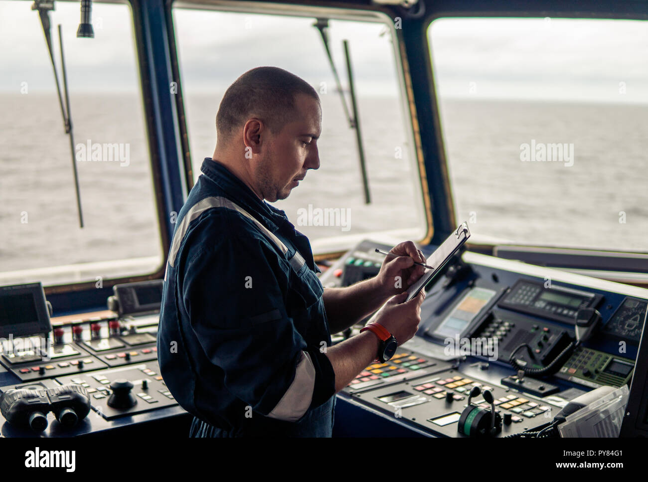 Marine navigational officer or chief mate on navigation watch Stock ...