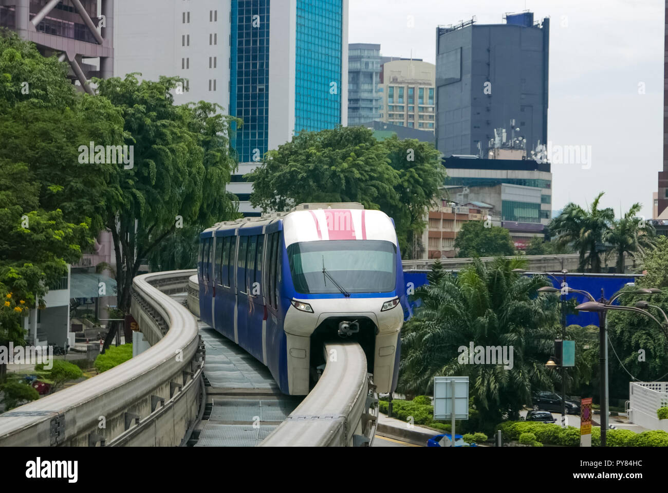 Fast train in Asian city Stock Photo - Alamy