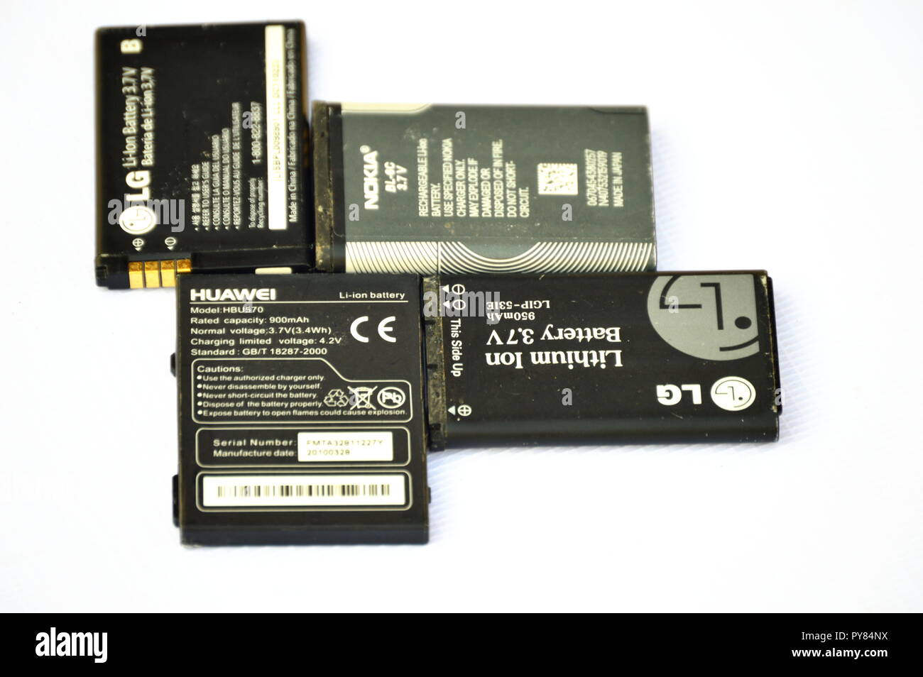 Some Lithium Ion batteries on white background Stock Photo - Alamy