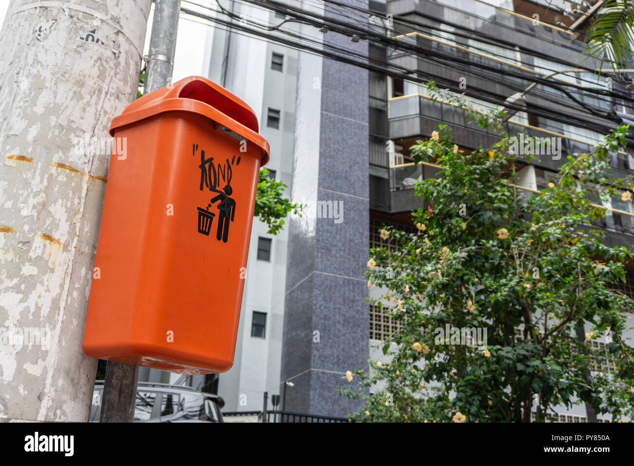 Orange Trash Can in the Streets Stock Photo - Alamy