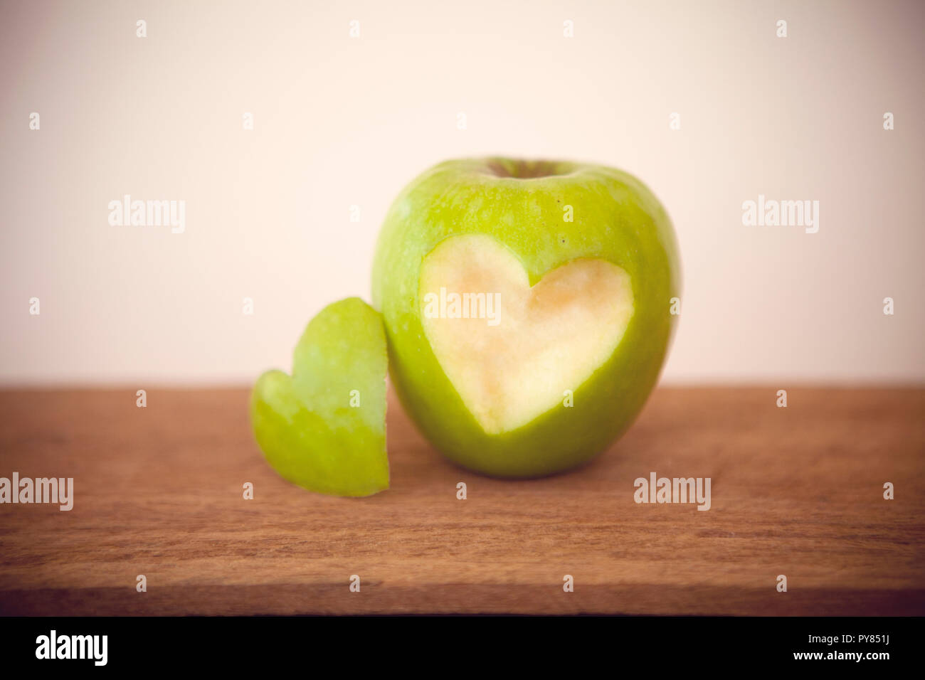 Apple with a bite taken out hi-res stock photography and images - Alamy