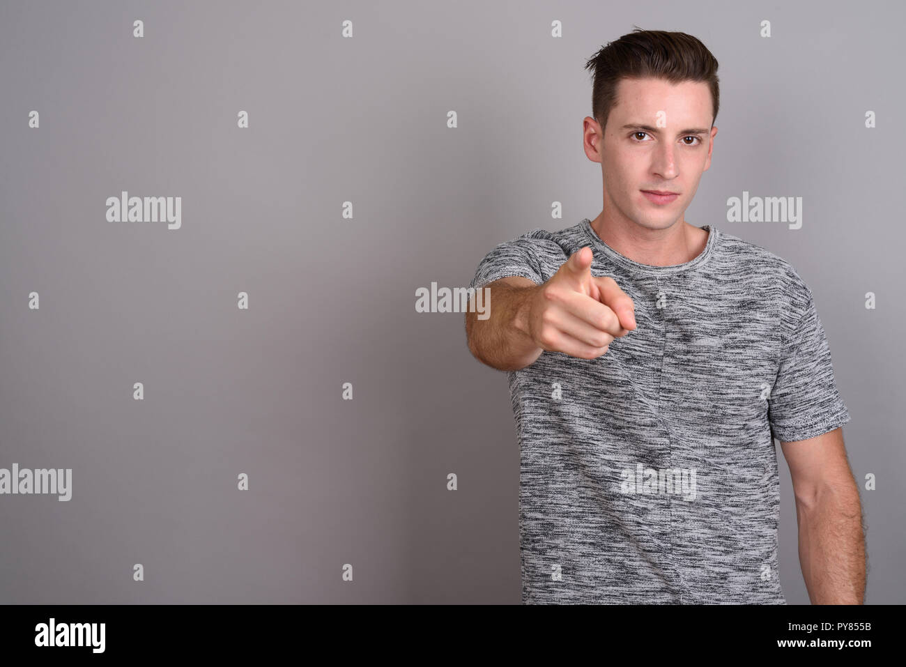 Casual men pointing camera hi-res stock photography and images - Alamy