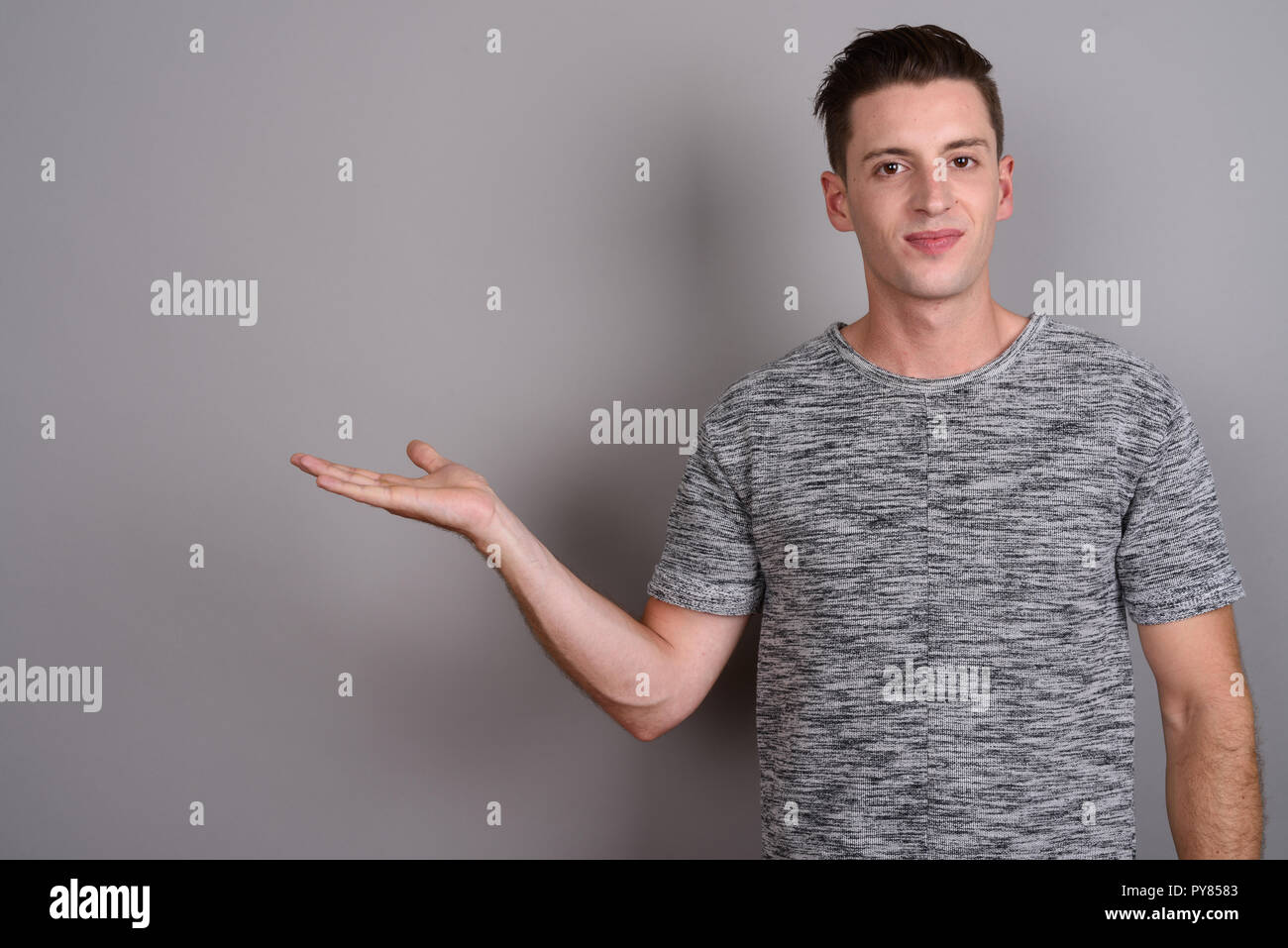 Man presenting something hi-res stock photography and images - Alamy