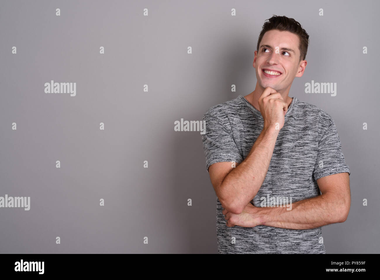 Thinking young man hi-res stock photography and images - Alamy