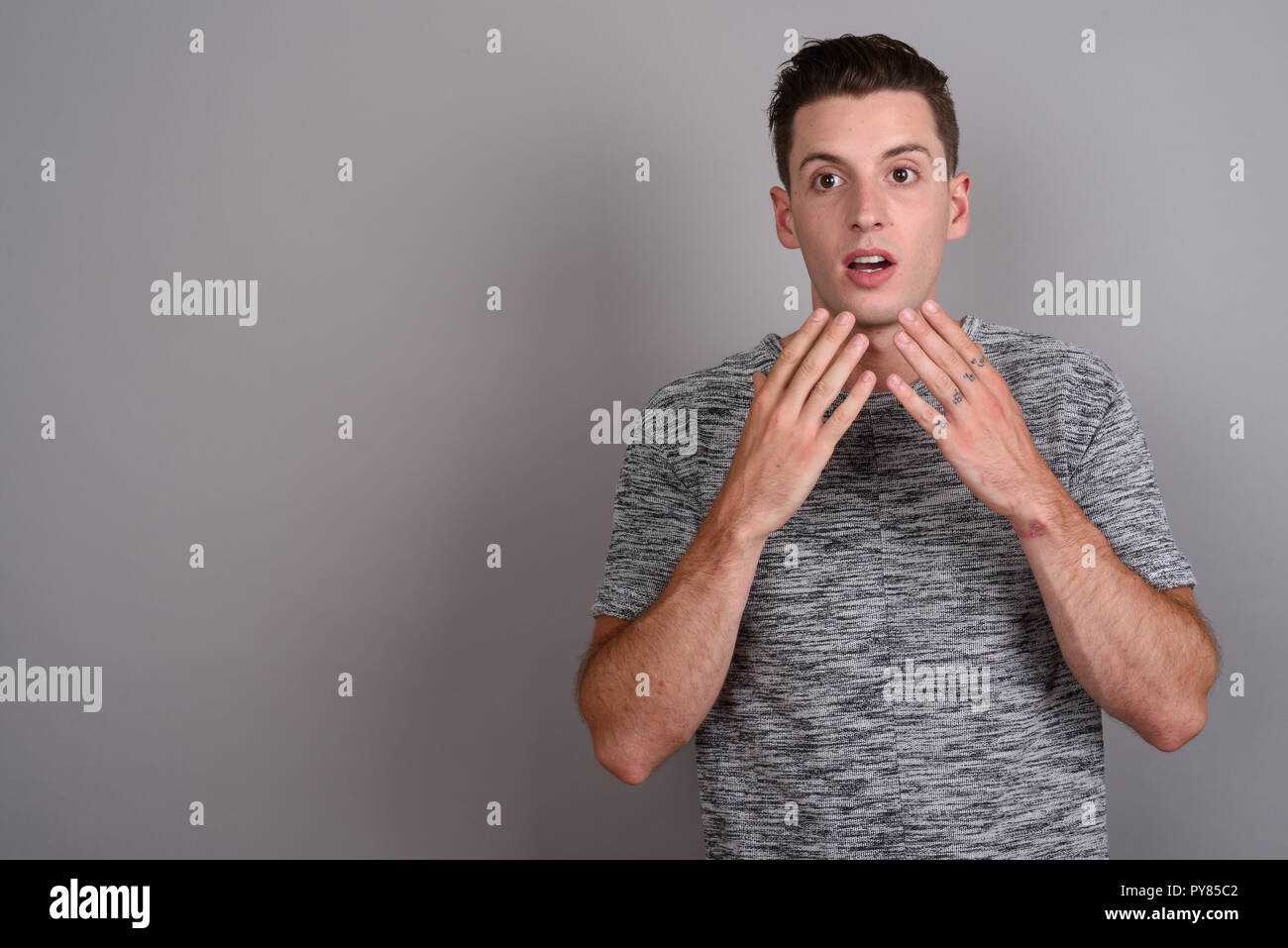 Young guy shocked hi-res stock photography and images - Alamy