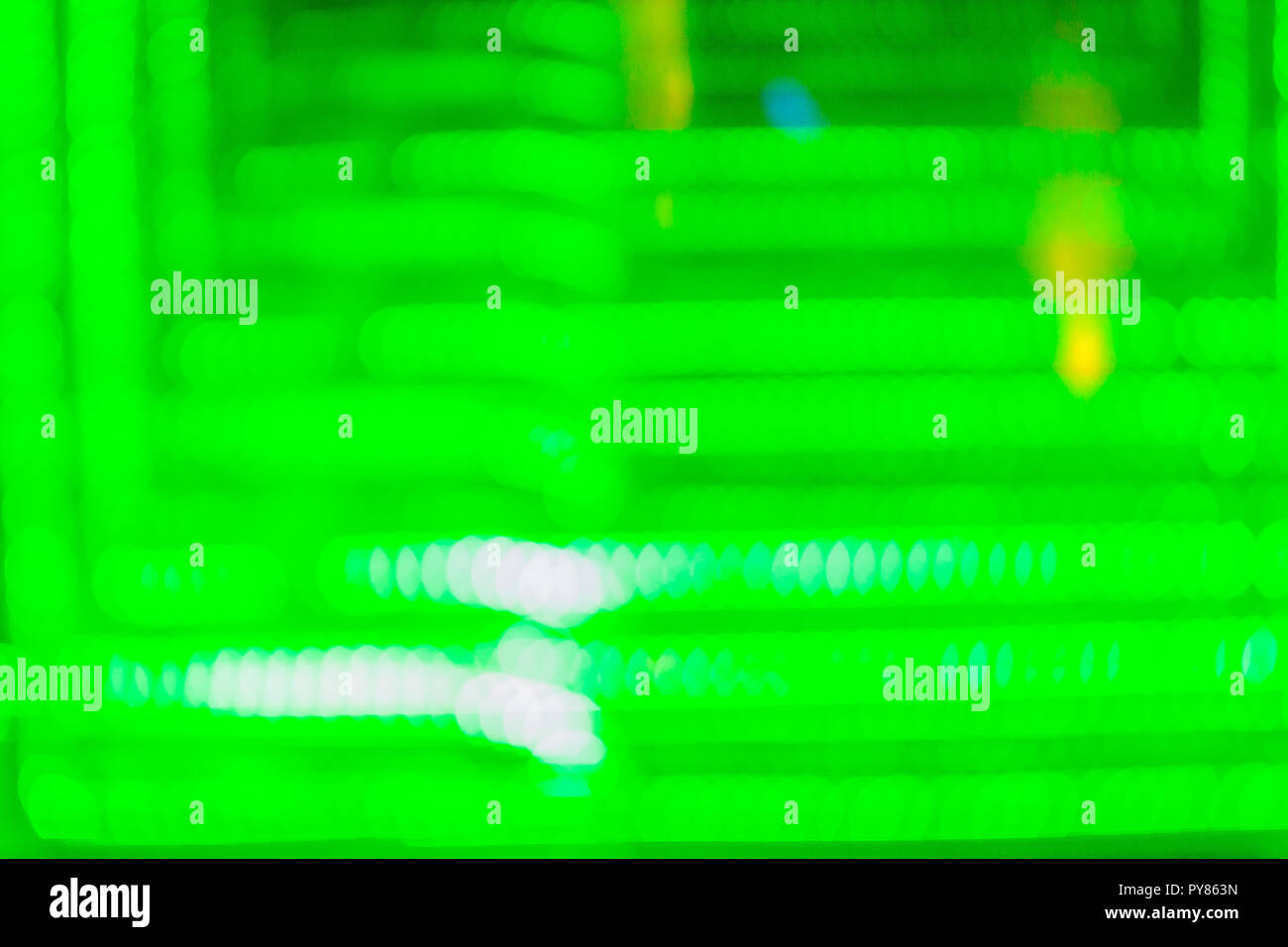 Abstract futuristic green led lights background. Blinking green neon ...