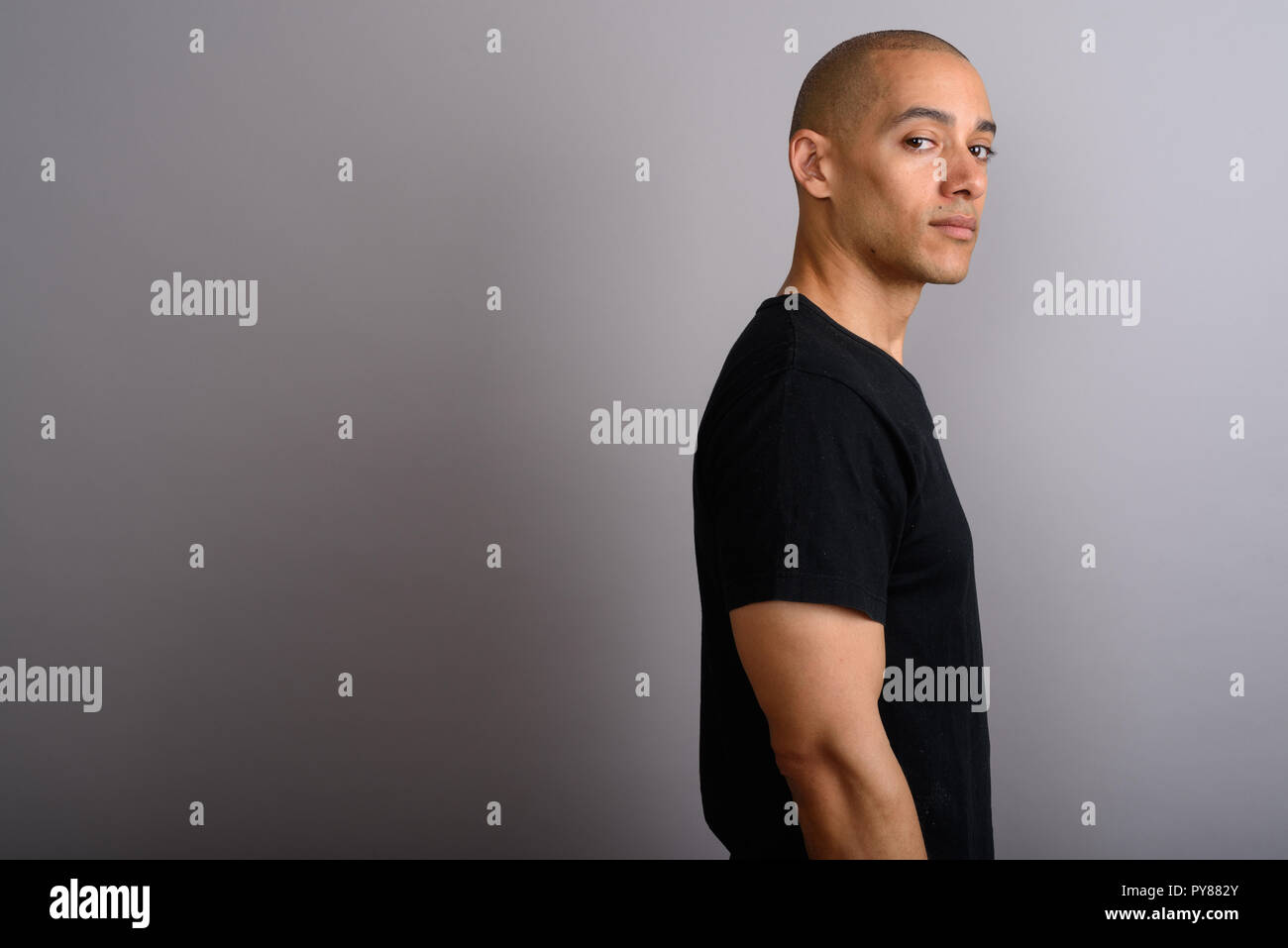 Handsome bald multi ethnic hi-res stock photography and images - Alamy