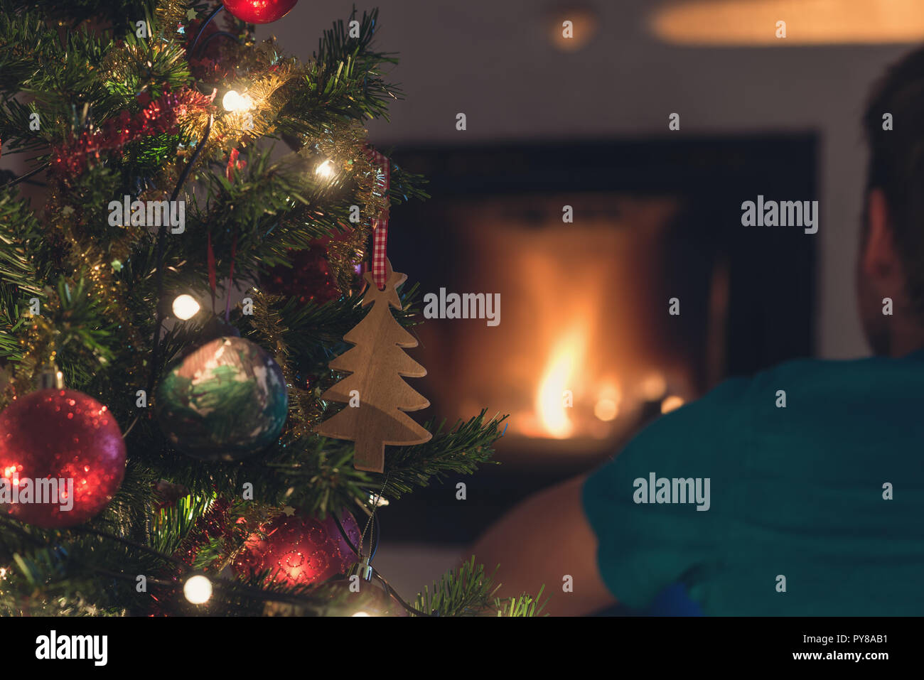 Sitting in front of fireplace hi-res stock photography and images - Alamy