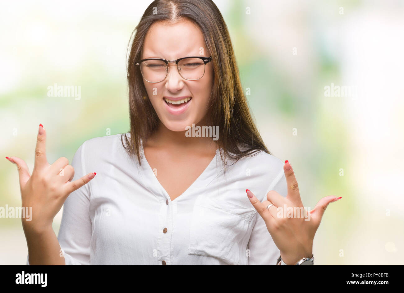 Young caucasian beautiful business woman wearing glasses over isolated ...