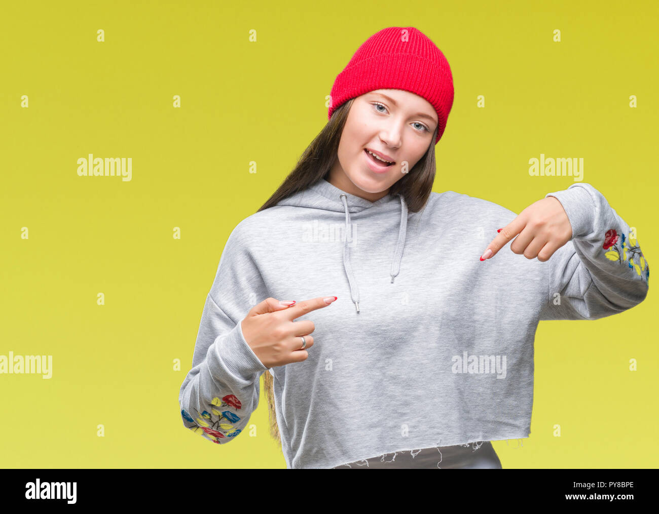 Young caucasian beautiful woman wearing wool cap over isolated ...