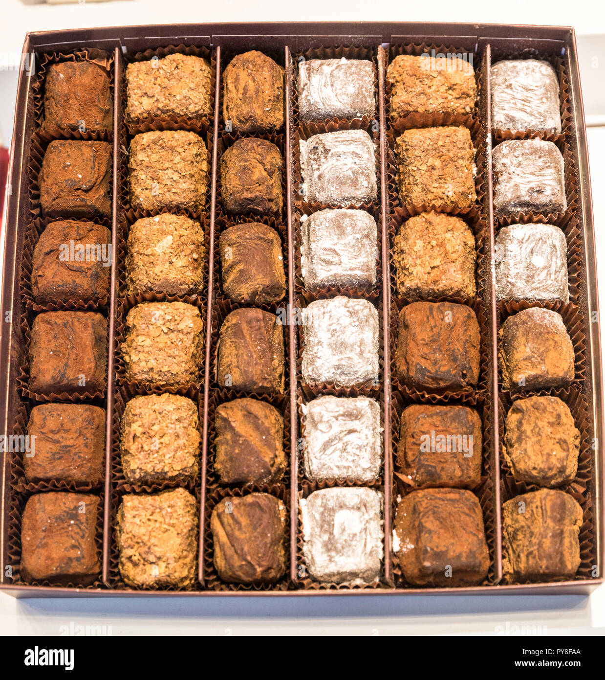 Chocholate truffels in the box close up Stock Photo - Alamy