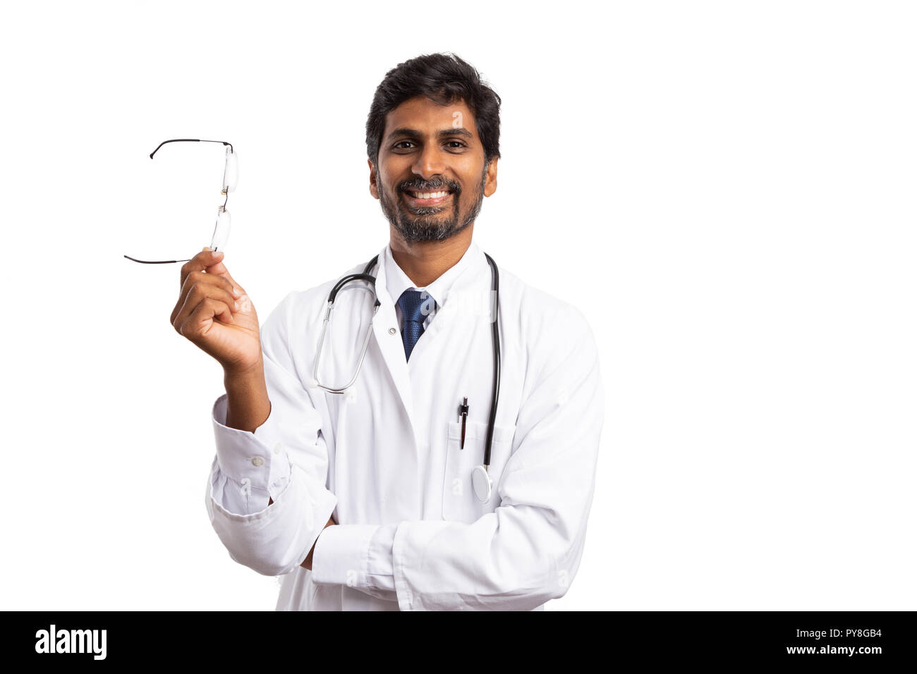 Friendly eye doctor smiling and gesturing with spectacles in air ...