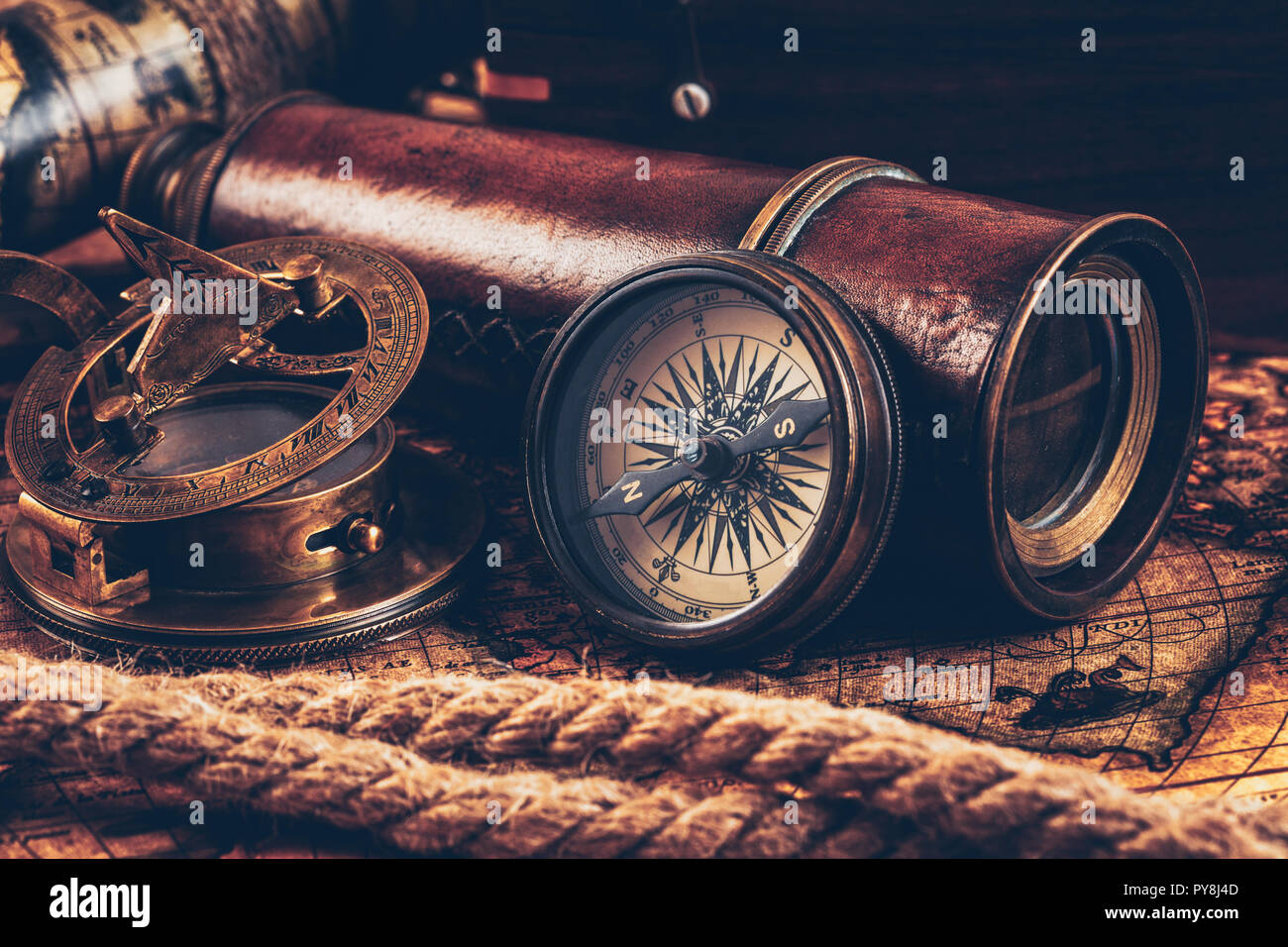 Antique brass compass on map hi-res stock photography and images - Alamy