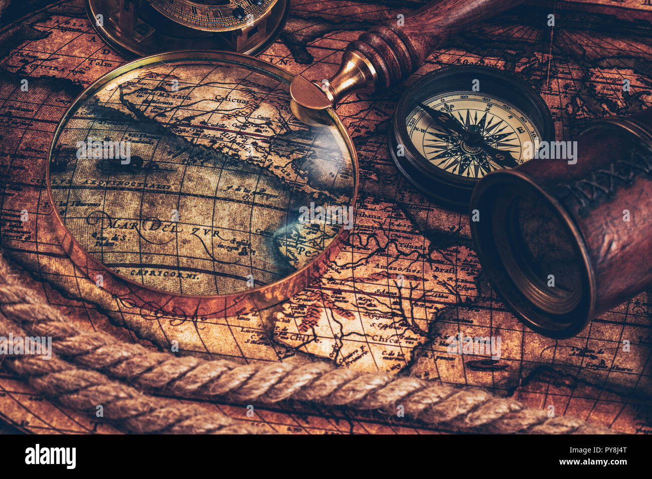 Old vintage compass on ancient map Stock Photo - Alamy