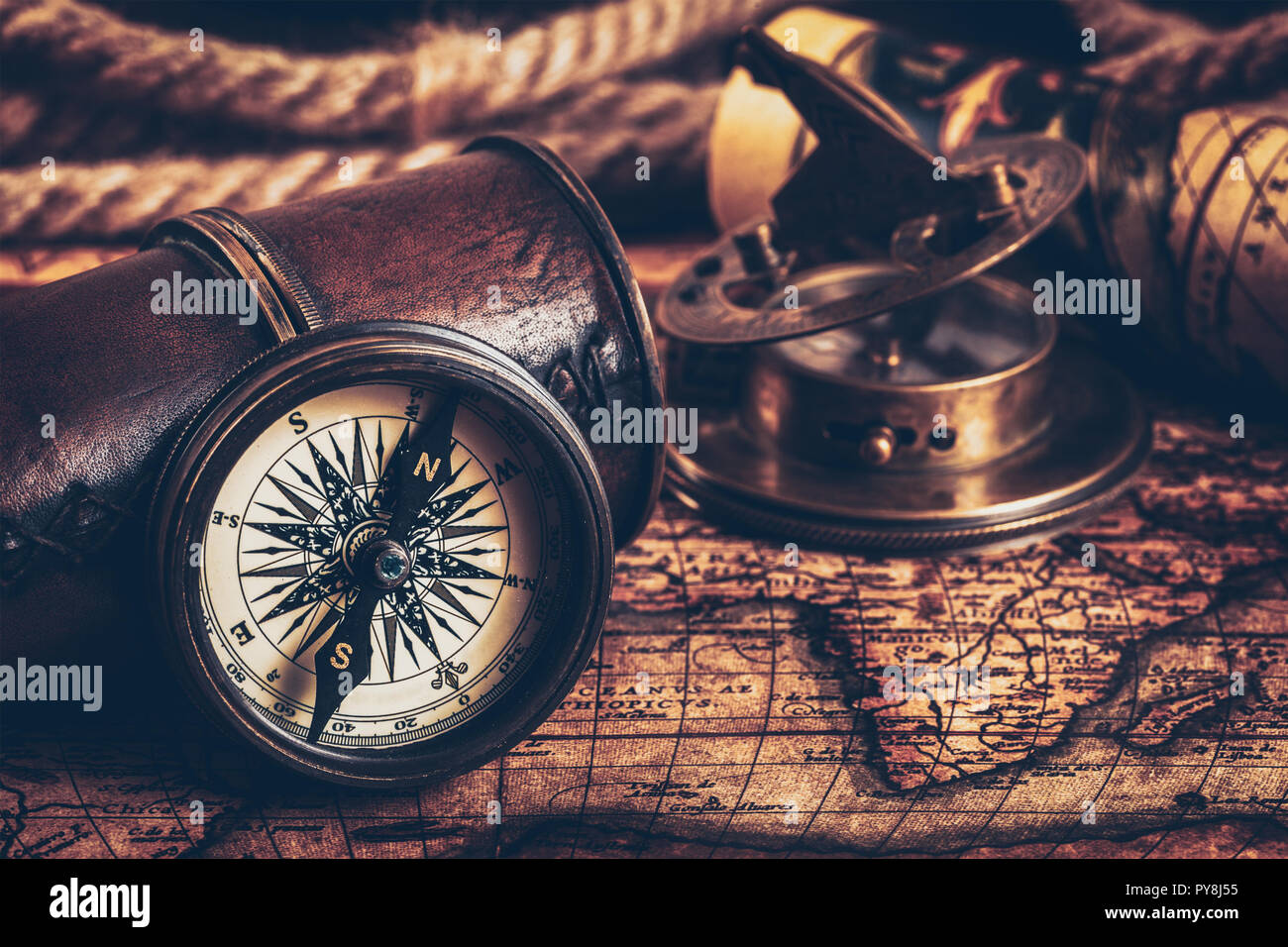 Old vintage compass on ancient map Stock Photo - Alamy