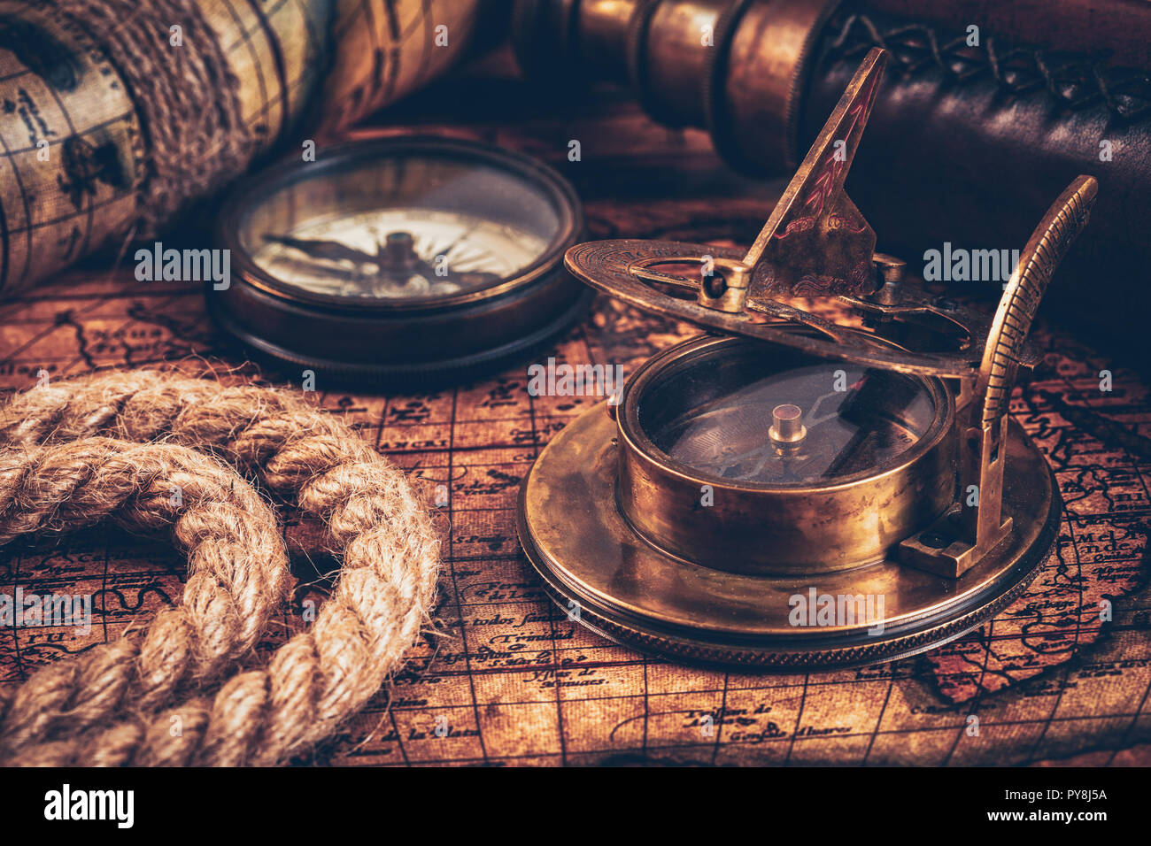 Old vintage compass on ancient map Stock Photo - Alamy
