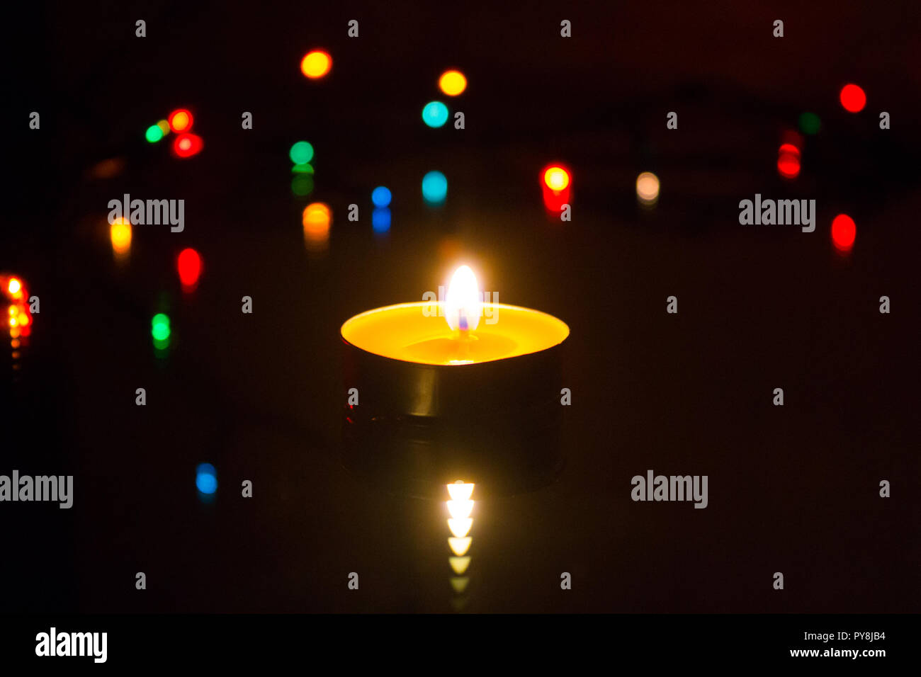 Wax candles burn in dark light. Wax candle. Burning fire Light from the ...