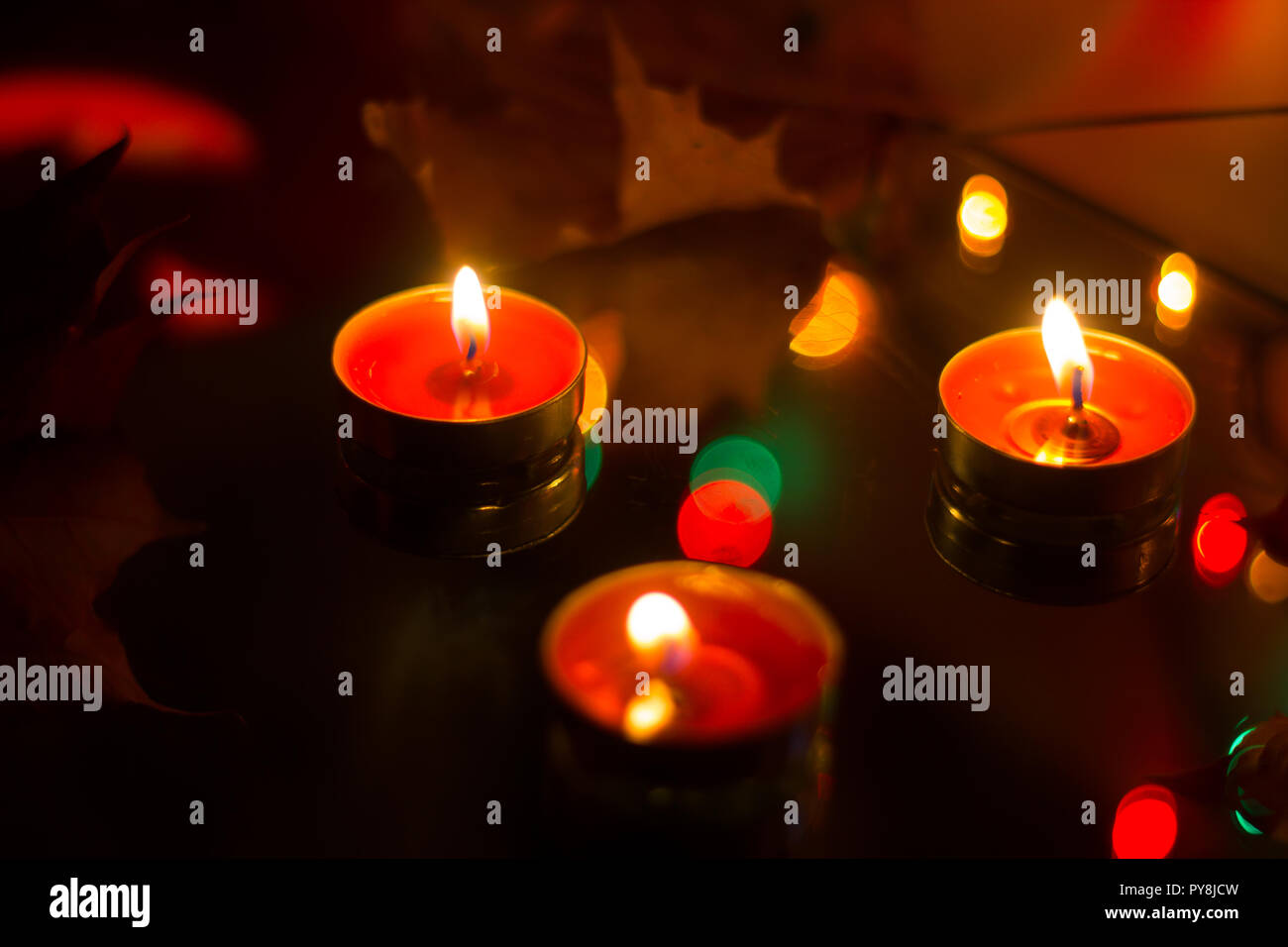 Wax candles burn in dark light. Wax candle. Burning fire Light from the ...
