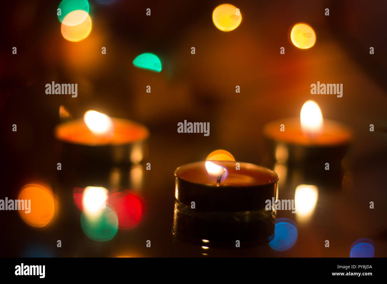 Wax candles burn in dark light. Wax candle. Burning fire Light from the ...