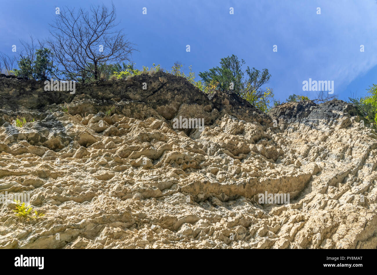view of rock cliff from below Stock Photo - Alamy
