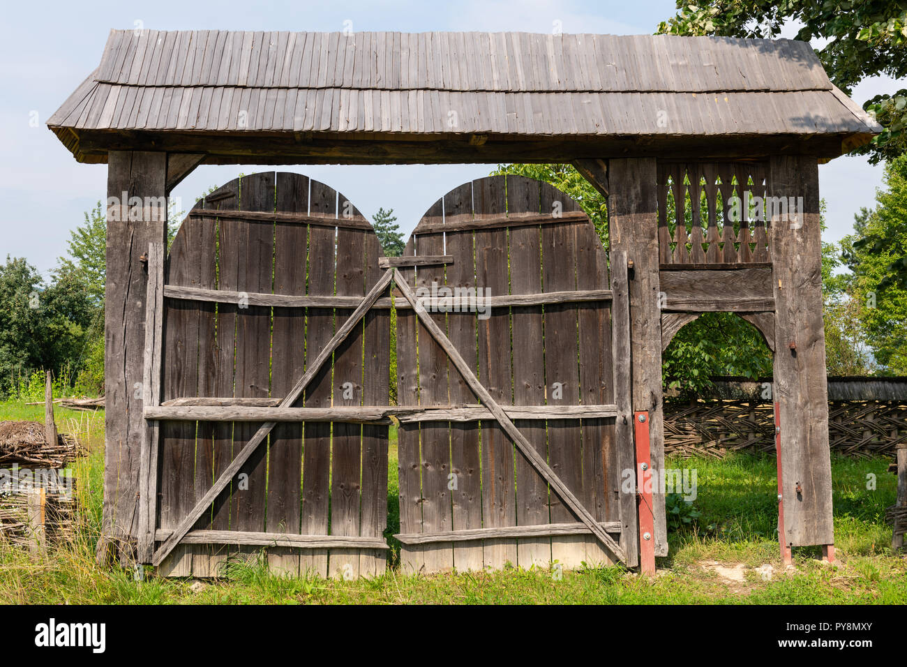 Traditional handmade wooden carved gate from Maramures region in ...