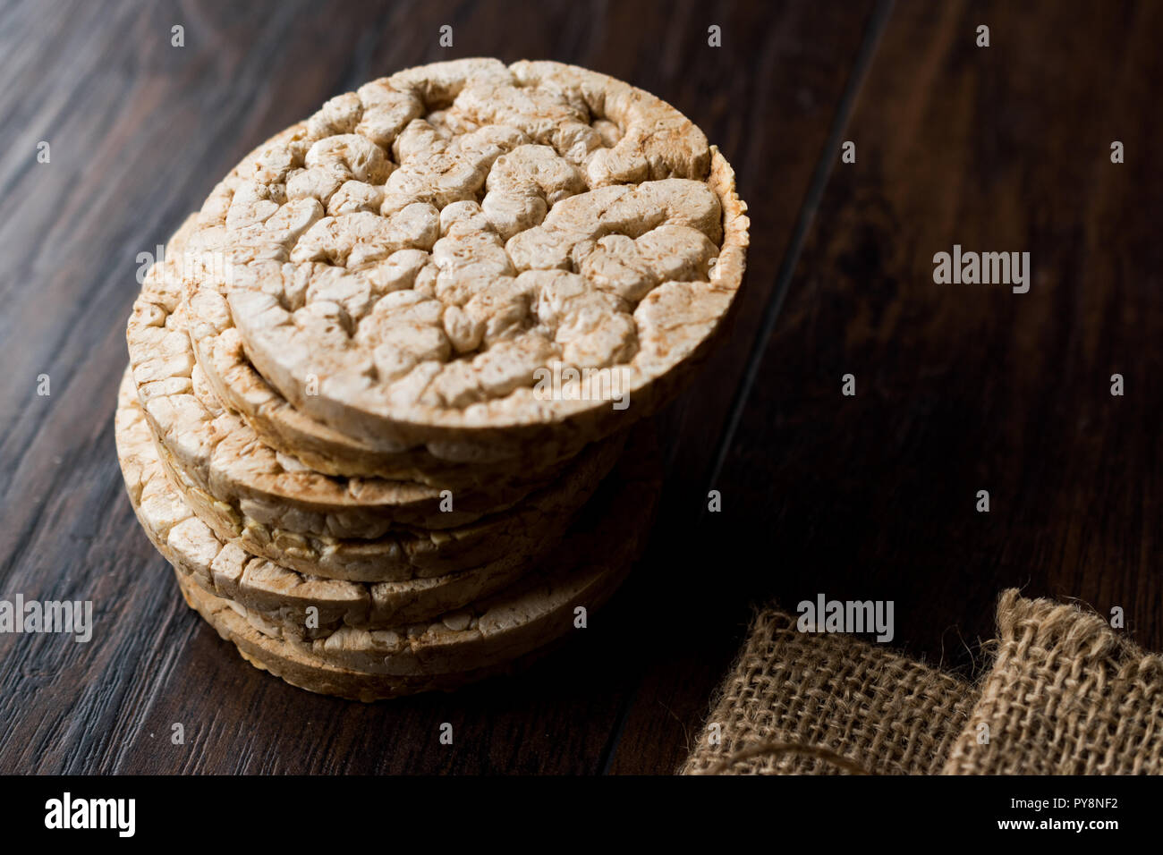 Bulgur Rice Cake Crackers Round Shaped on Dark Wooden Surface. Organic ...