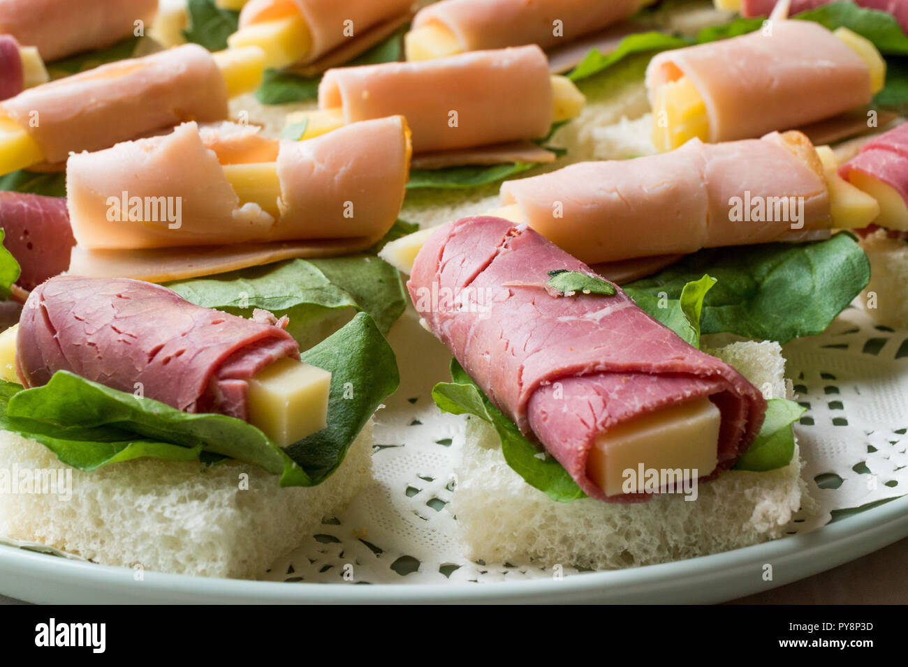 Canape Ham Wrapped with Cheese and Greens in Round Plate. Organic ...
