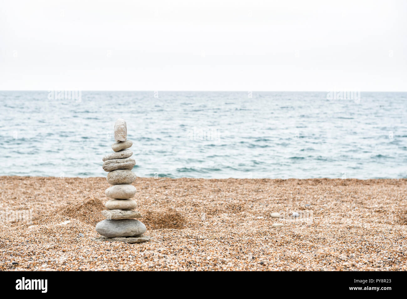 Stack of pebbles on the beach Stock Photo - Alamy