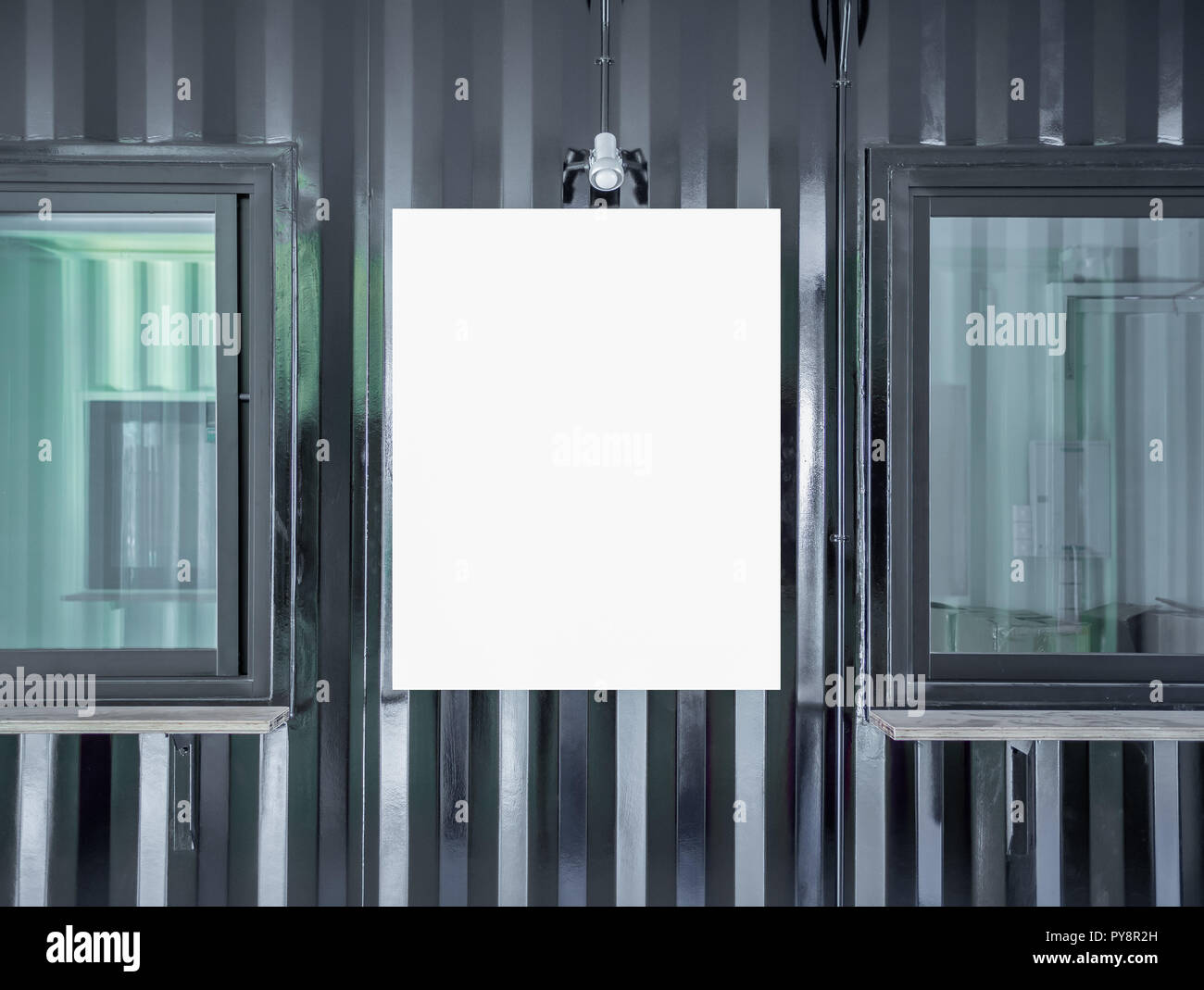 Blank white mock up poster frame on shipping container wall building ...