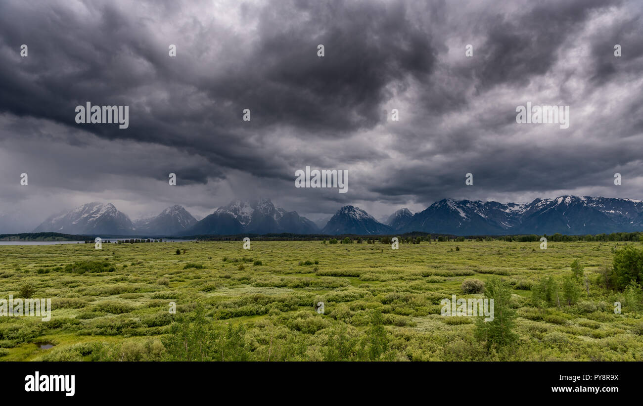 Wide Tetons View with Dark Stormy Clouds Brewing Overhead Stock Photo - Alamy
