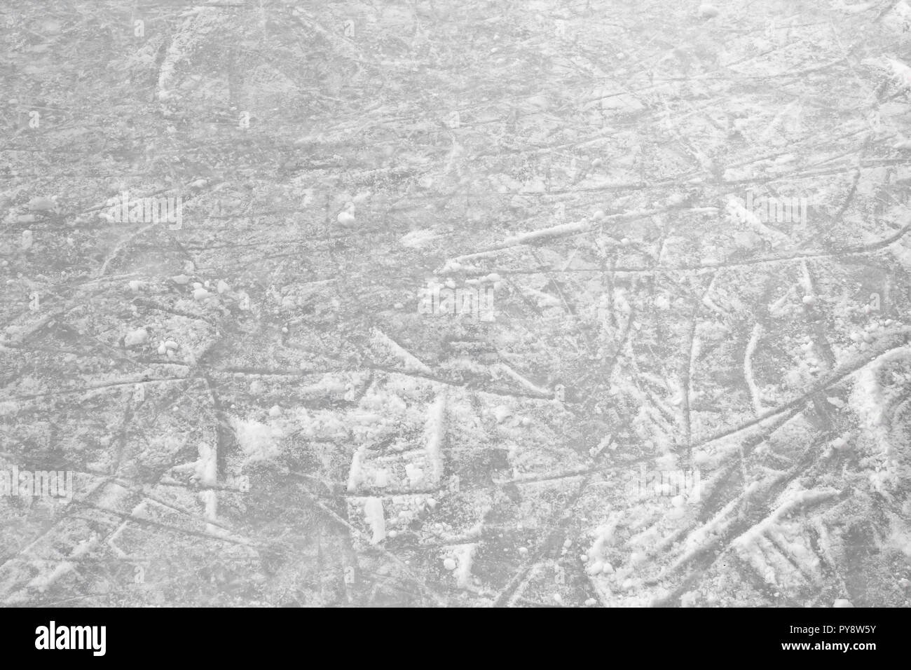 Ice rink floor, detail of a textured background ice. Sports and seasons ...