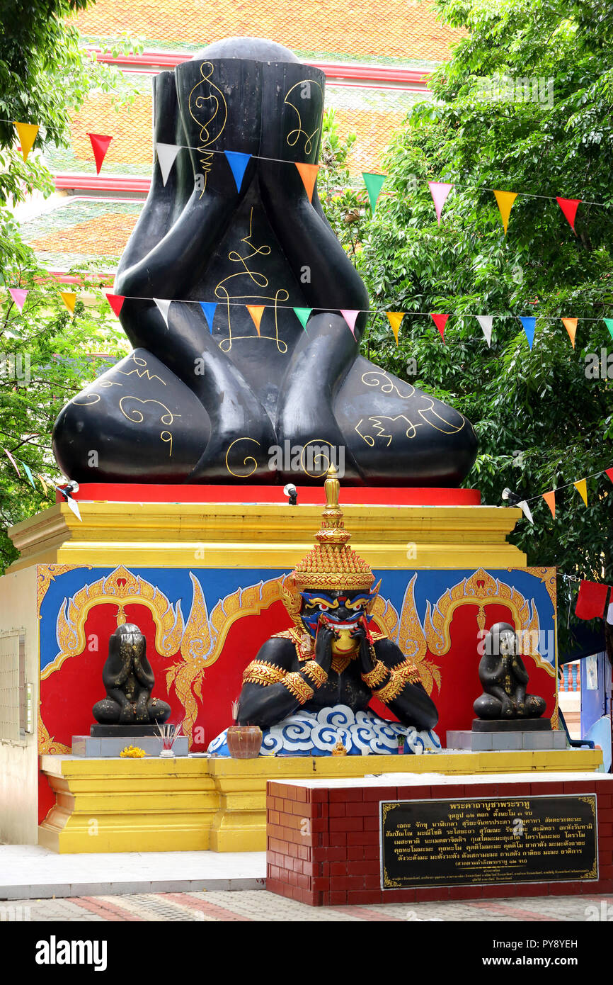 Phra Pidta (closed eyes buddha) and Phra Rahu at Thai temple Stock ...