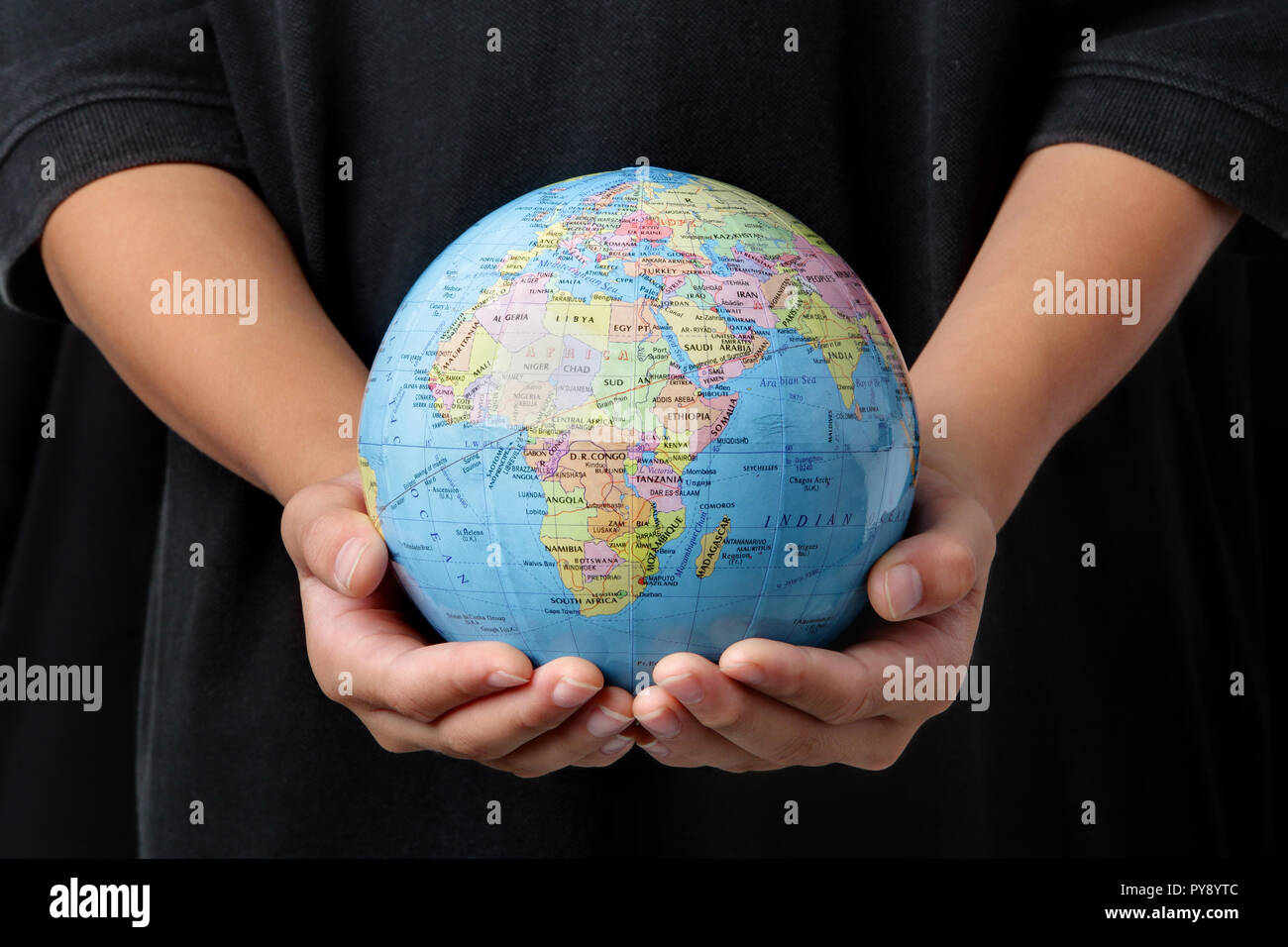 Save the Earth : Globe in two palm hands Stock Photo - Alamy