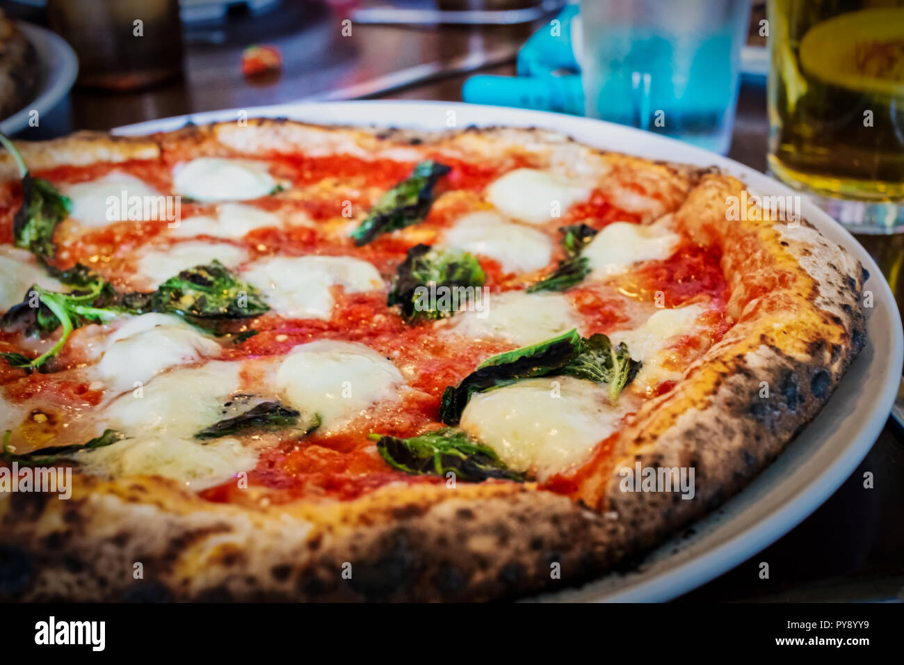 Table pizza on plates hi-res stock photography and images - Alamy