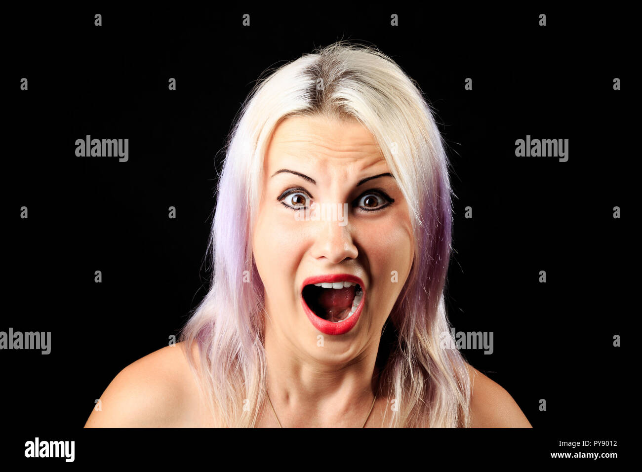 afraid female face expression, scared screaming girl Stock Photo - Alamy