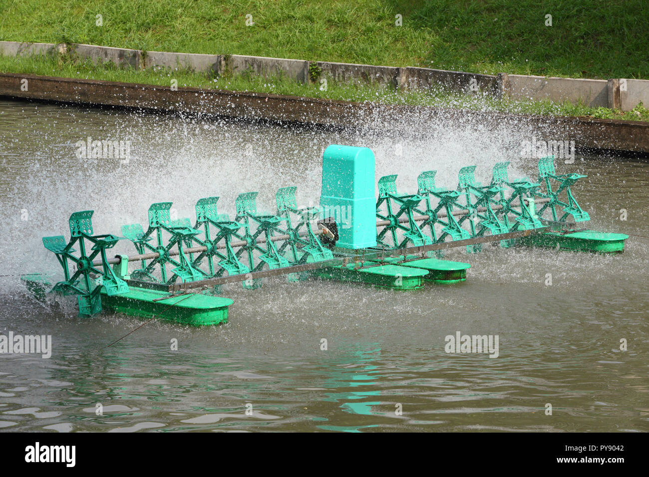 Water treatment by aerator Stock Photo - Alamy