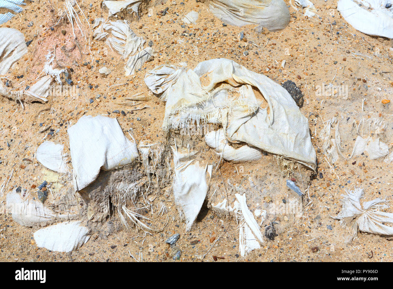 Cracked sand bag after years of weather Stock Photo - Alamy