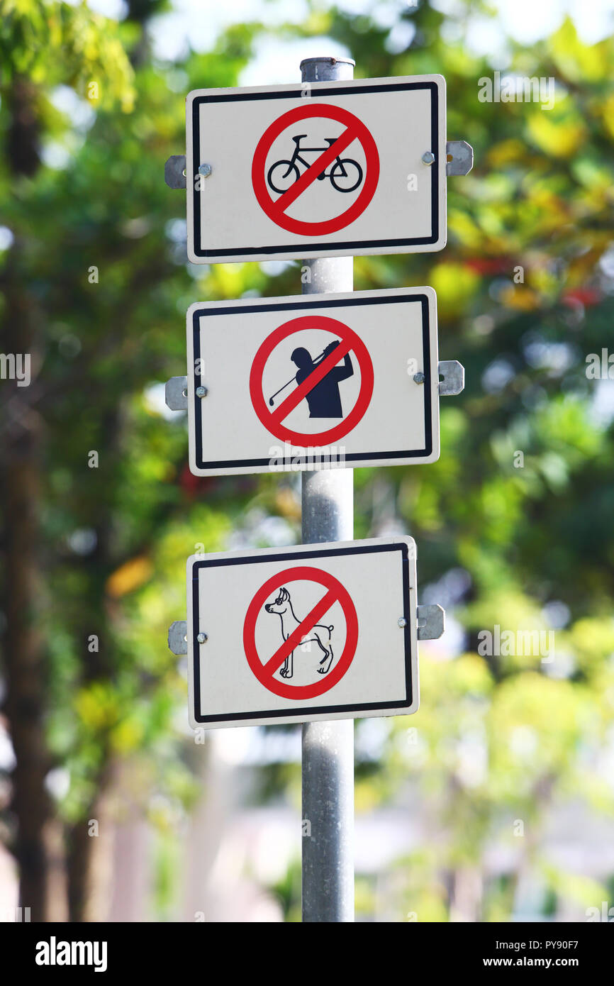 Warning sign in the park Stock Photo - Alamy