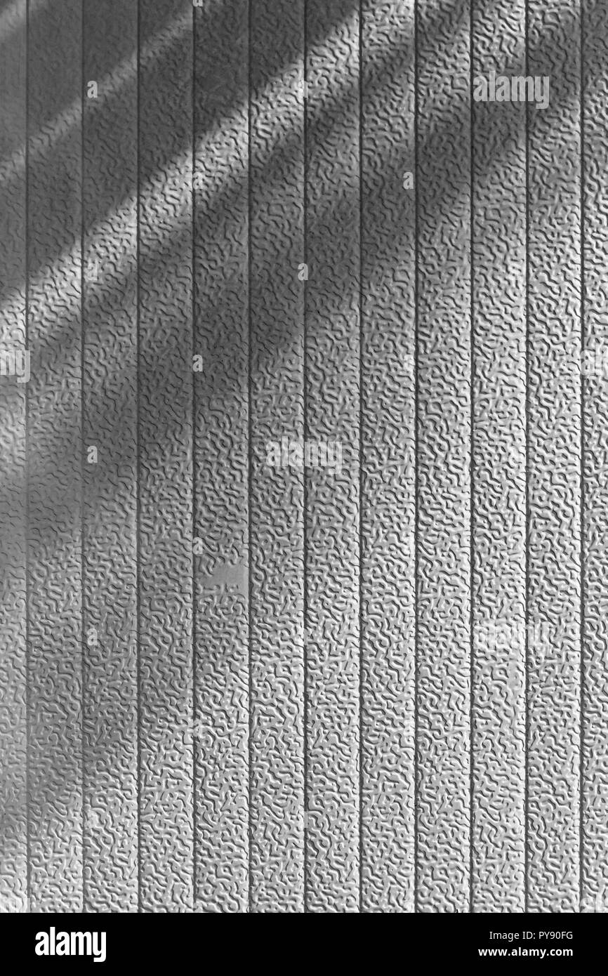 Gray wall background in shadow Stock Photo - Alamy