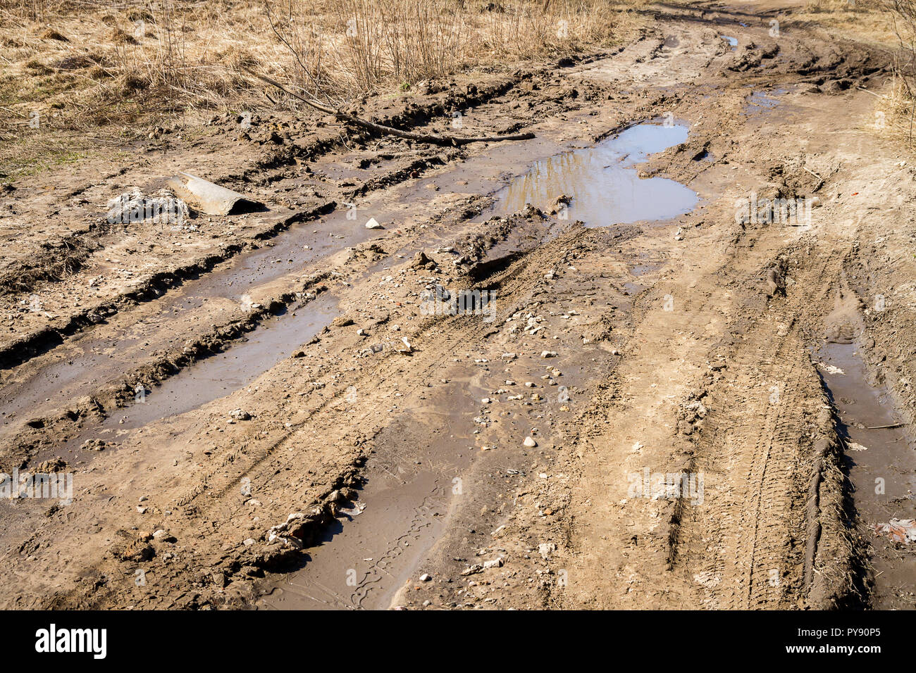 Deep puddle on a dirty road hi-res stock photography and images - Alamy