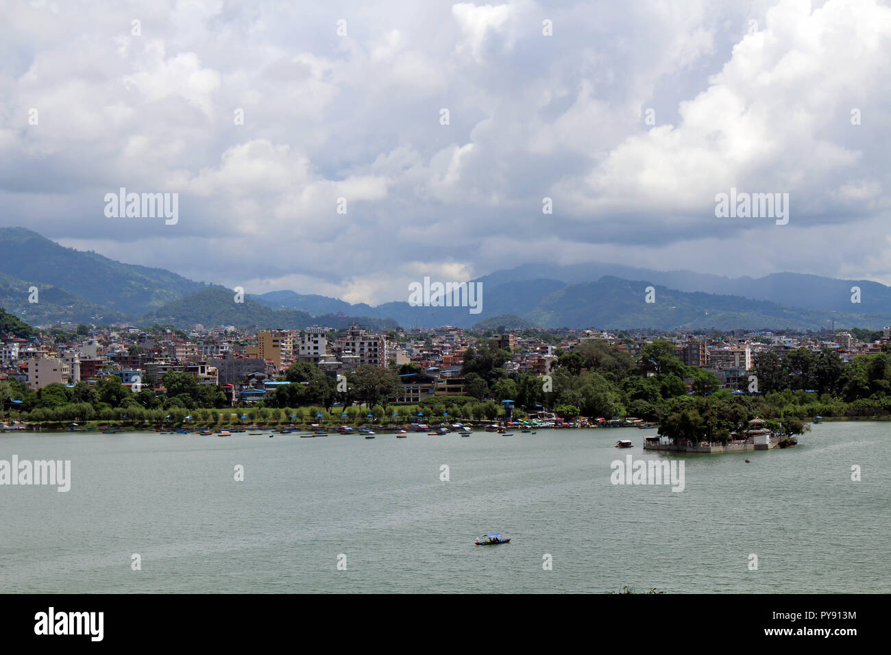Tal Barahi Temple in Phewa Lake and hills in Pokhara, a popular tourist ...