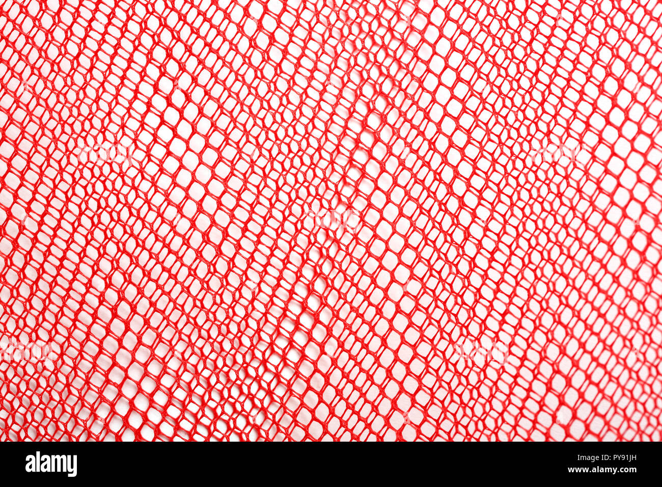 Abstract red plastic net background Stock Photo - Alamy